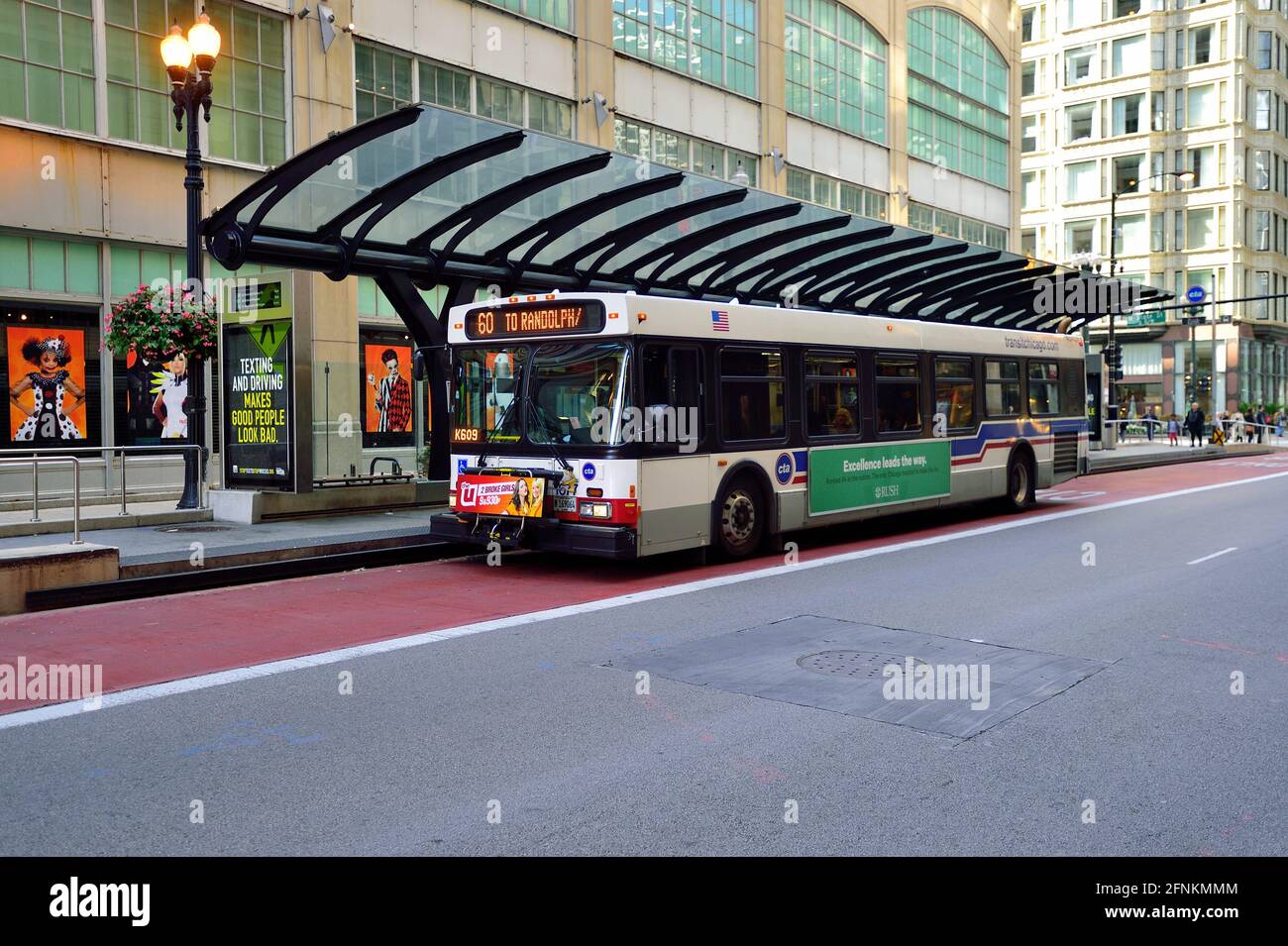 Chicago, Illinois, USA. A CTA bus at a bus stop on Washington Street in ...