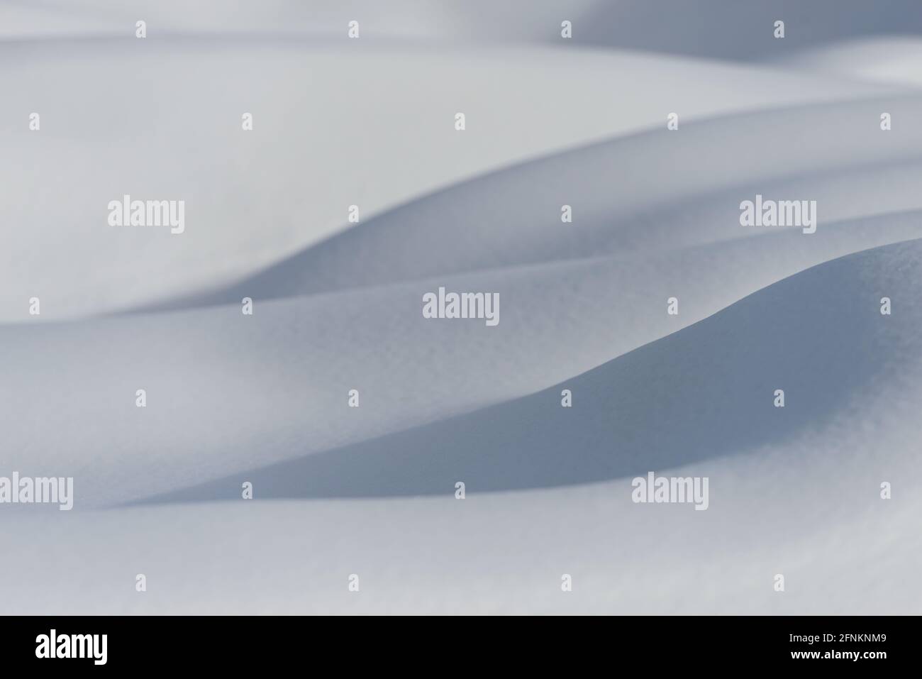 Snow shapes in Alaska. Light and shadows Stock Photo - Alamy