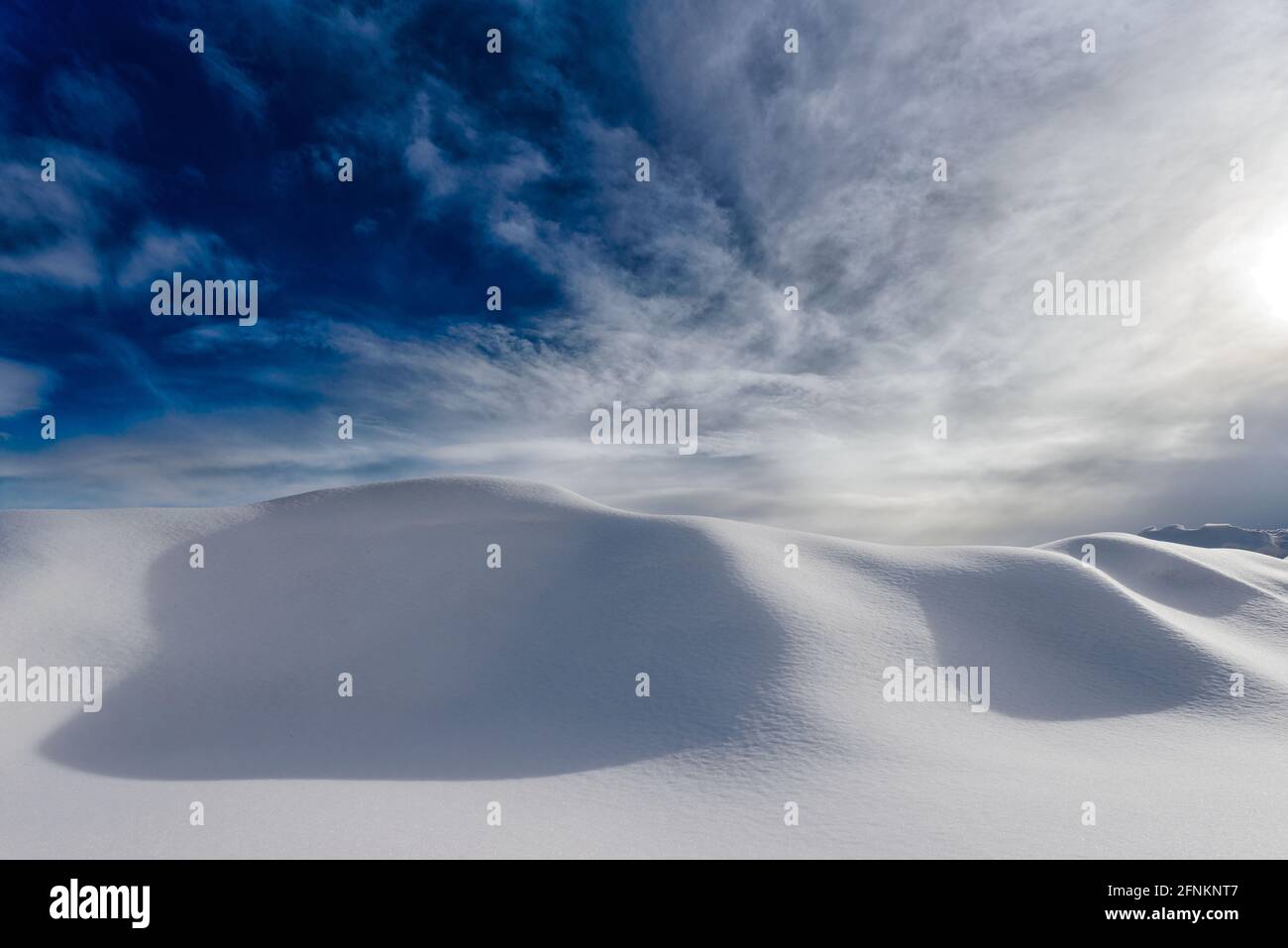 Snow shapes in Alaska. Light and shadows Stock Photo - Alamy