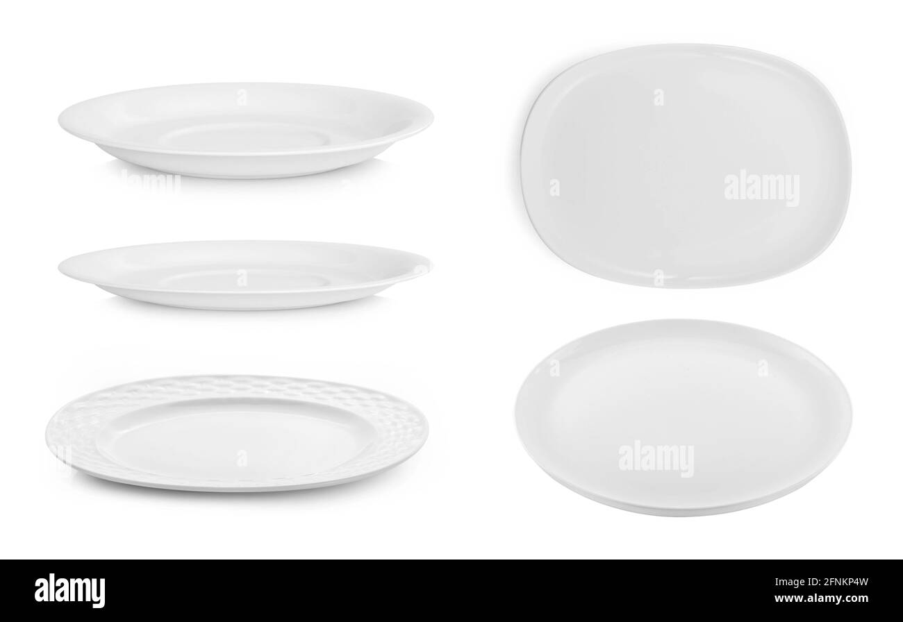 set of white plate on white background Stock Photo - Alamy