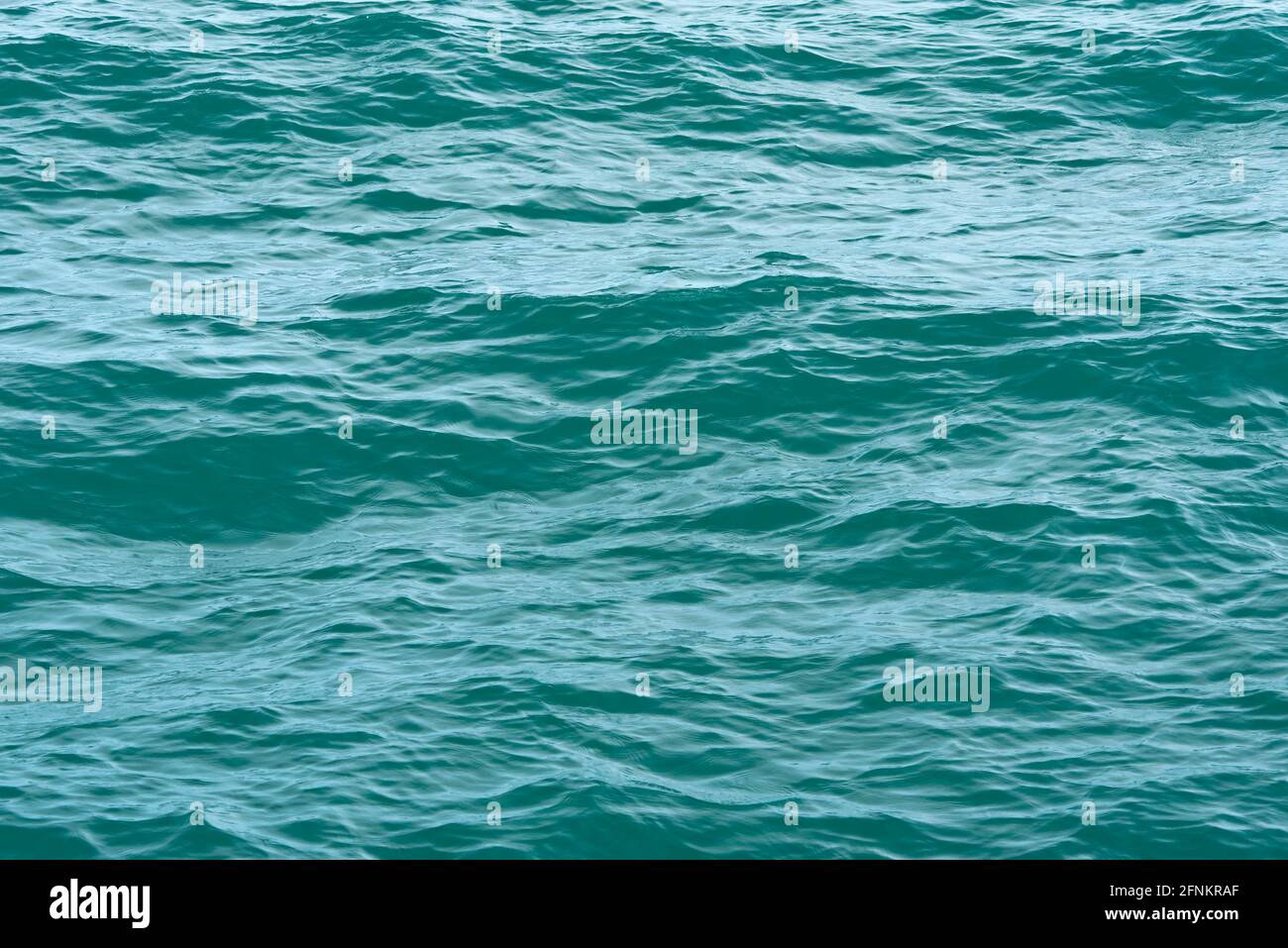 A close-up of the ocean wave surface wallpaper in the sunlight Stock ...