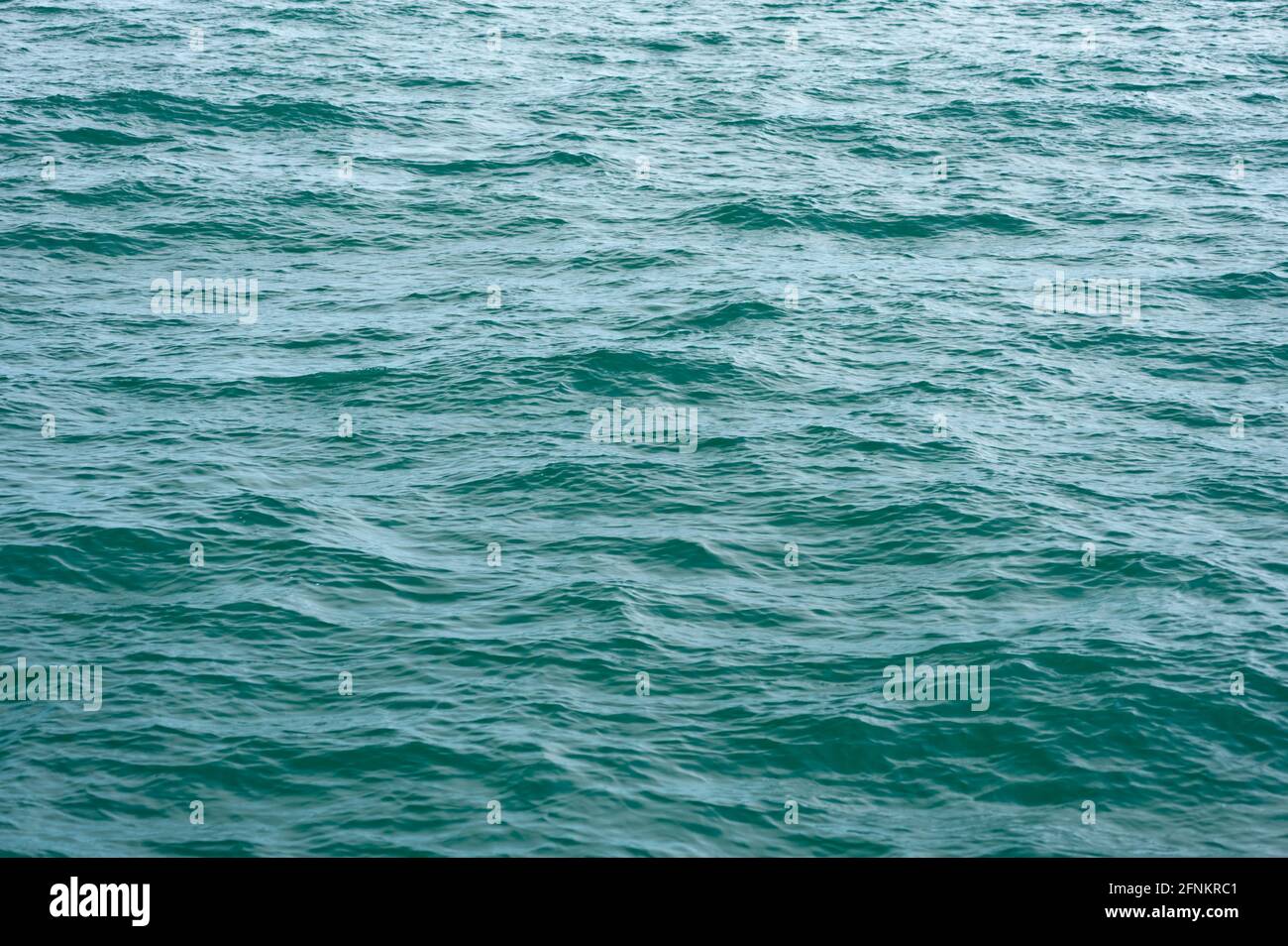 A close-up of the ocean wave surface wallpaper in the sunlight Stock ...