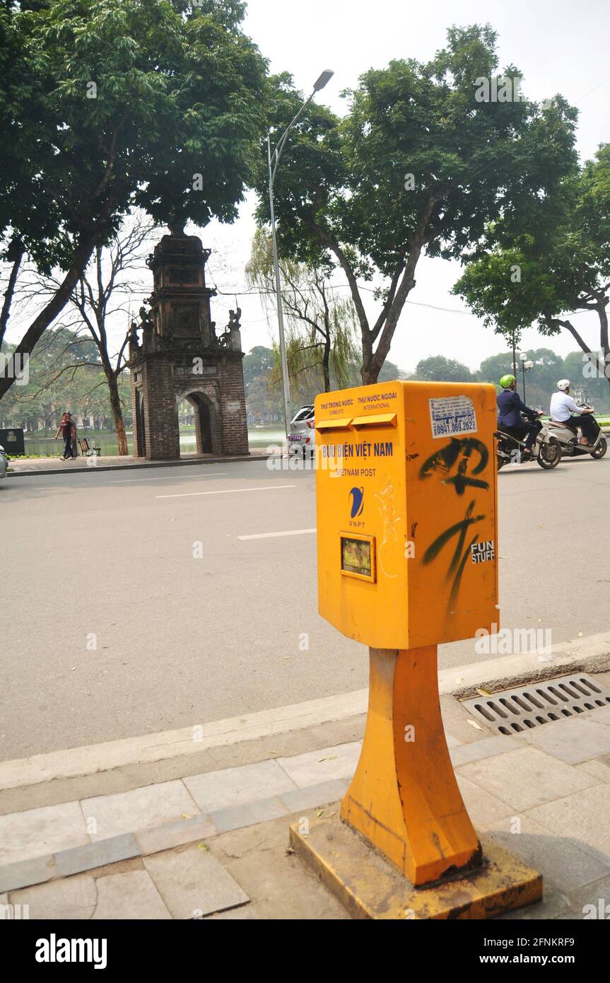 Yellow public post box on pathway for Vietnamese people use send ...