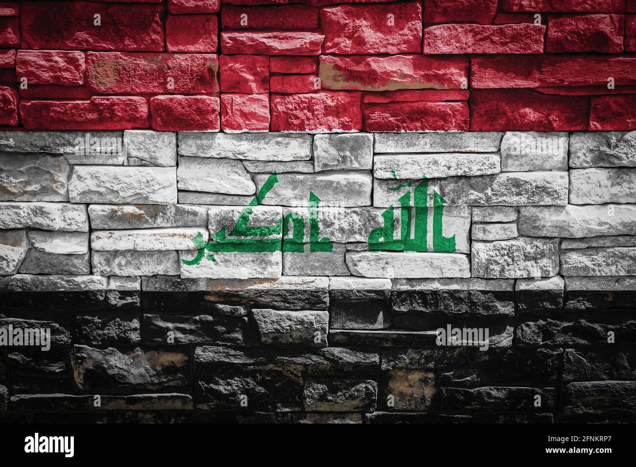 National flag of Irak on stone wall background.The concept of national ...