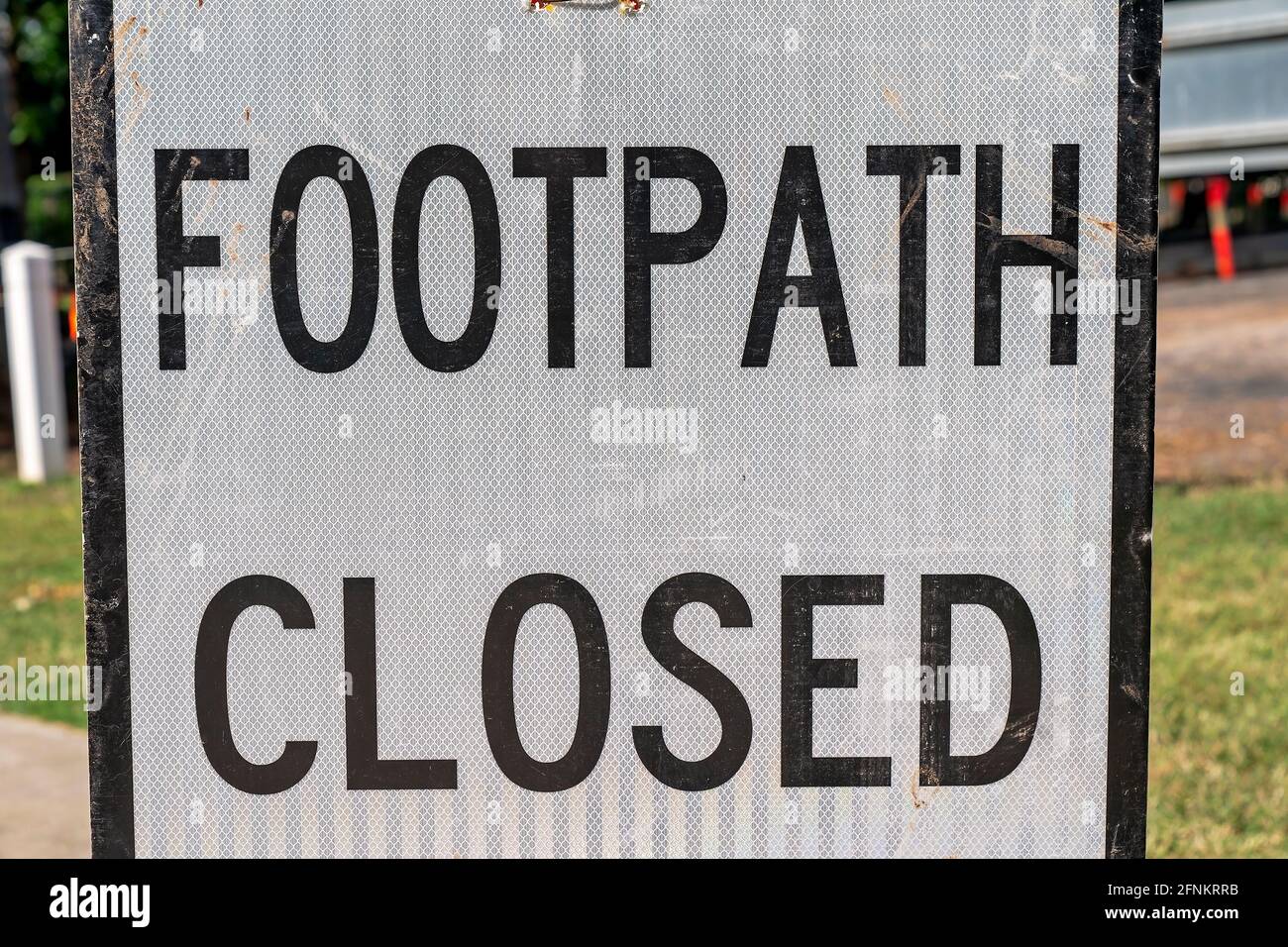 Footpath closed signage while construction repair work is completed ...