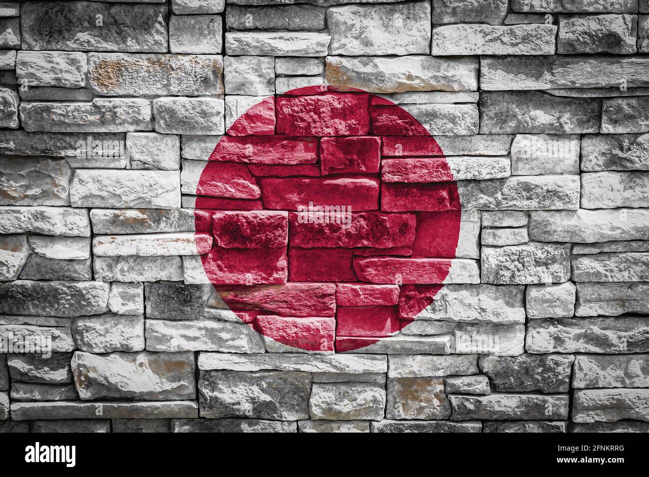 National flag of Japan on stone wall background.The concept of national ...