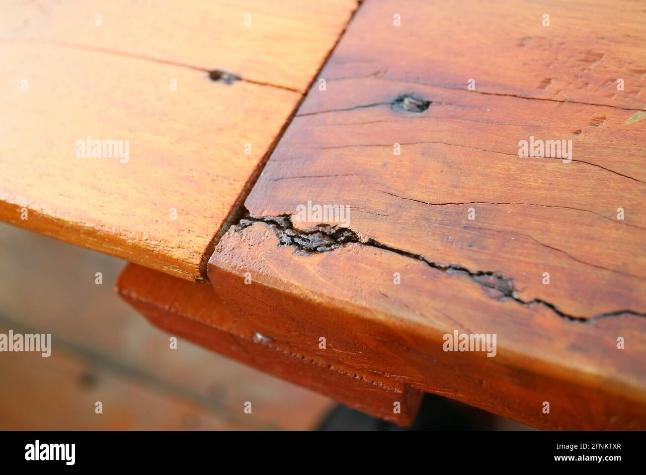 Cracked wood texture of a table photo Stock Photo - Alamy