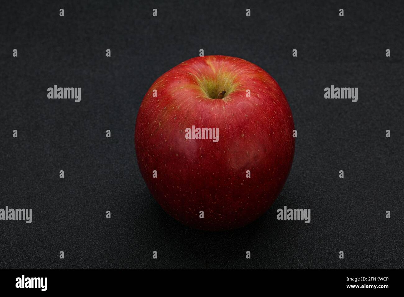 Single Red sweet tasty apple fruit Stock Photo - Alamy