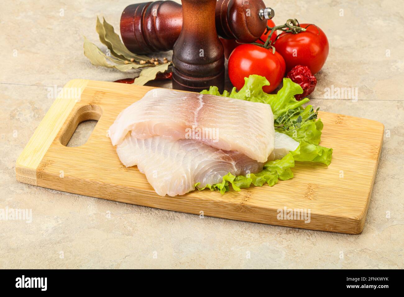 Raw pangasius fillet fish for cooking Stock Photo - Alamy
