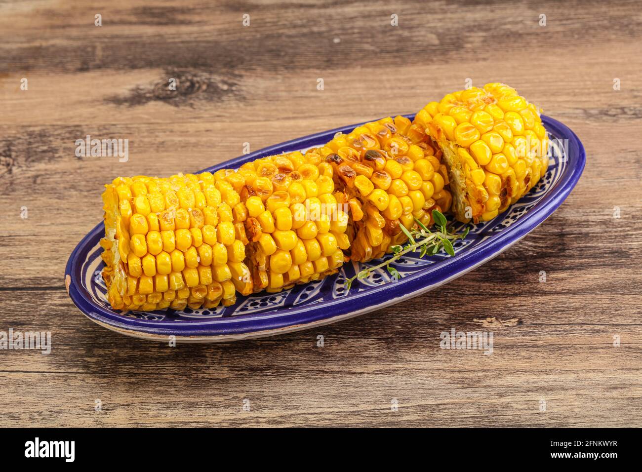 Grilled hot corn with oil and salt Stock Photo - Alamy