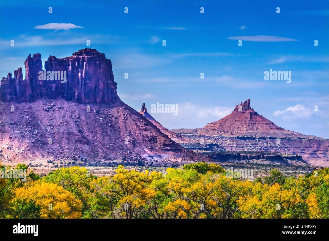 colorful pink buttes yellow conttonwood trees mountains autumn ...