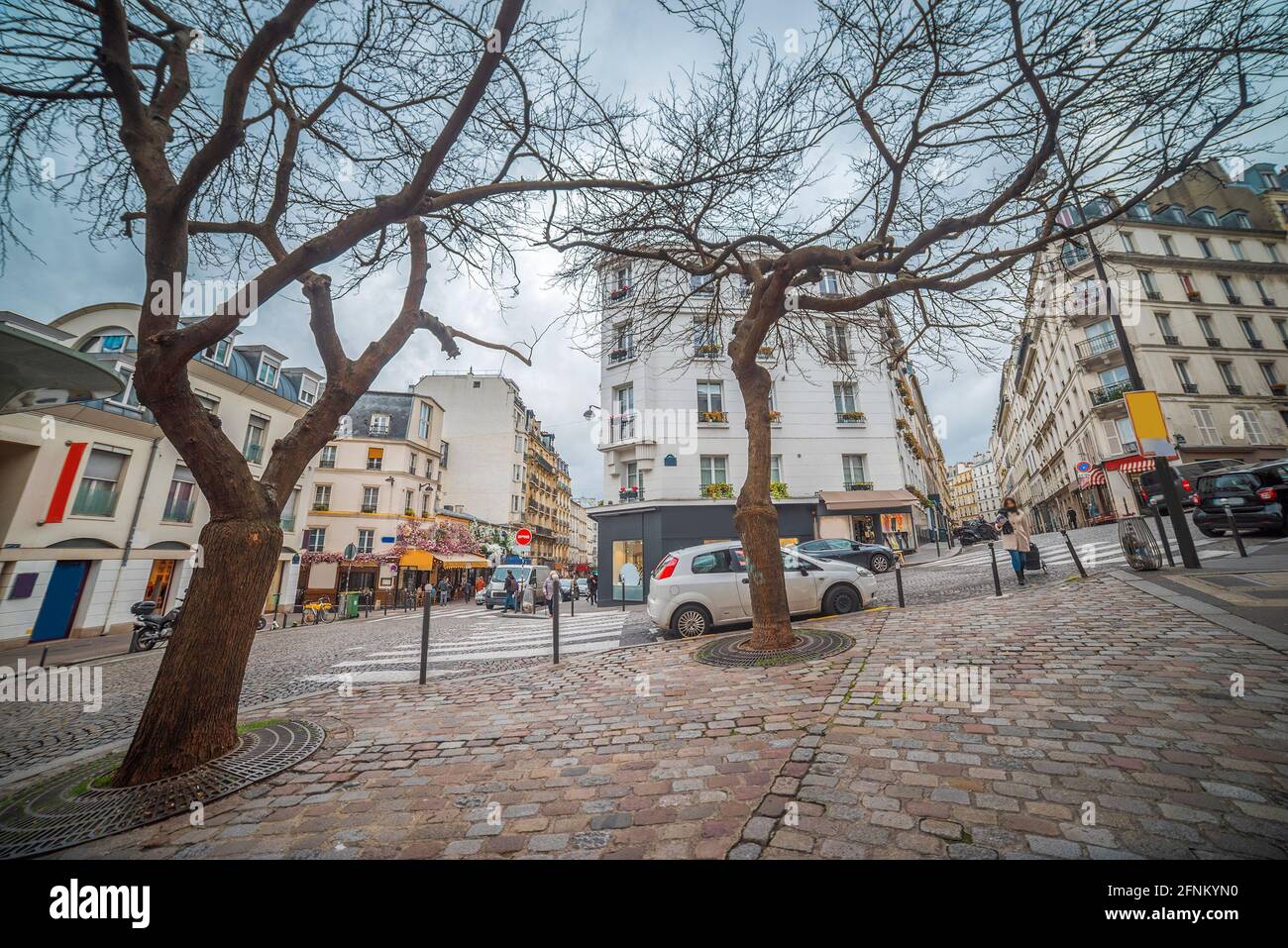 Montmartre, France. Street with houses. Sunset in Paris Stock Photo - Alamy