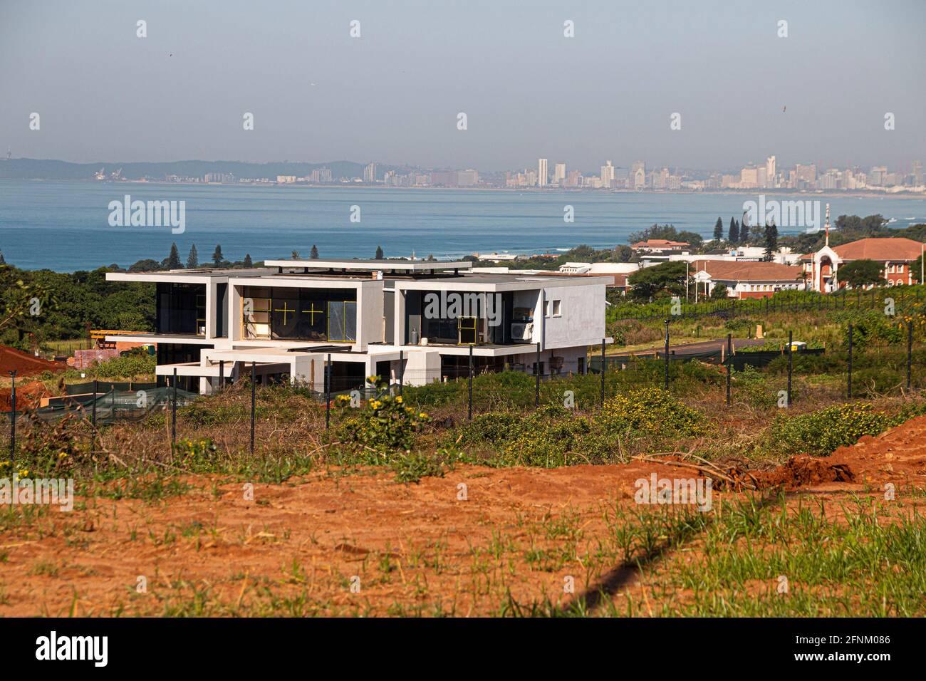 View of durban's beachfront buildings across calm bay Stock Photo - Alamy