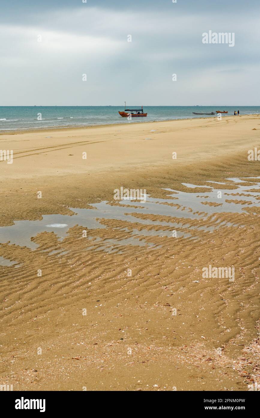 Beach patterns and small rivers on the beach formed by the low tide of ...