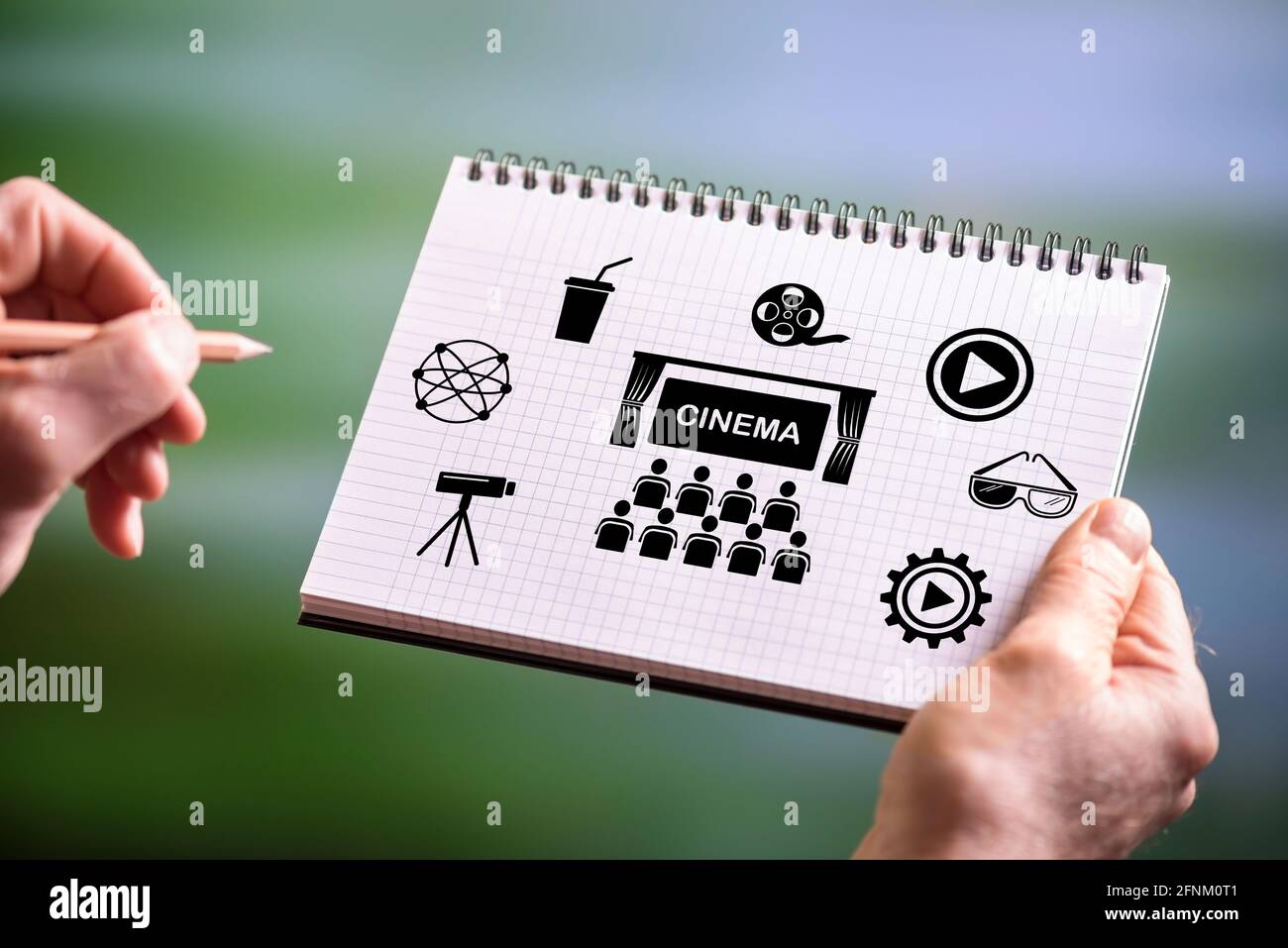 Hand drawing cinema concept on a notepad Stock Photo - Alamy