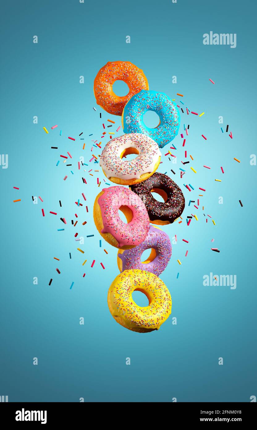 Colorful donuts flying with sprinkle explosion on blue background. 3D ...