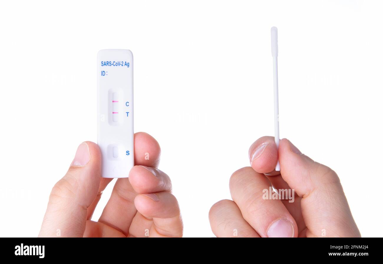 Rapid covid-19 strip test isolated on white - Positive tested Stock ...