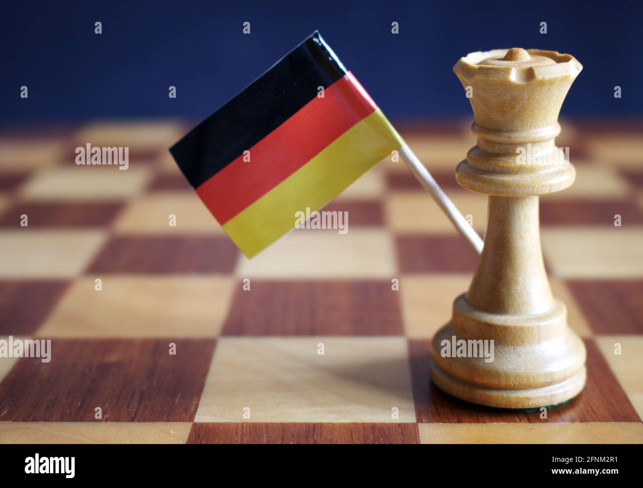 white chess queen with german flag Stock Photo - Alamy