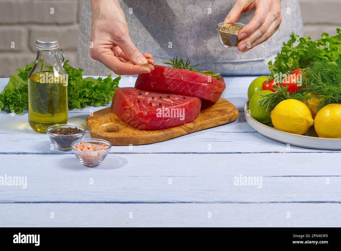 cooking tuna steak. Fresh Atlantic bluefin tuna steak, with spices and ...