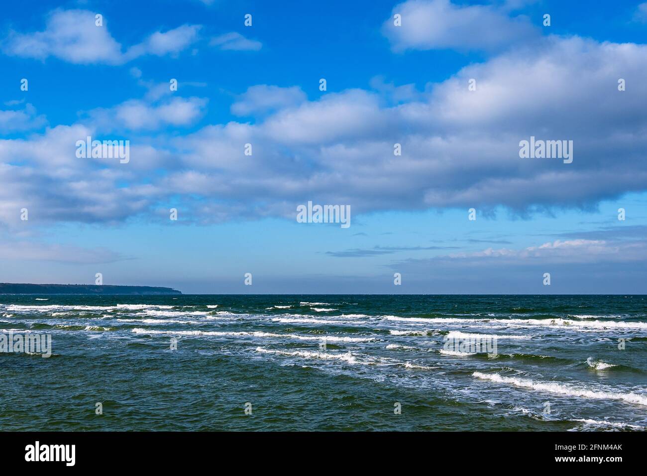 Waves on the beach in Warnemuende, Germany Stock Photo - Alamy