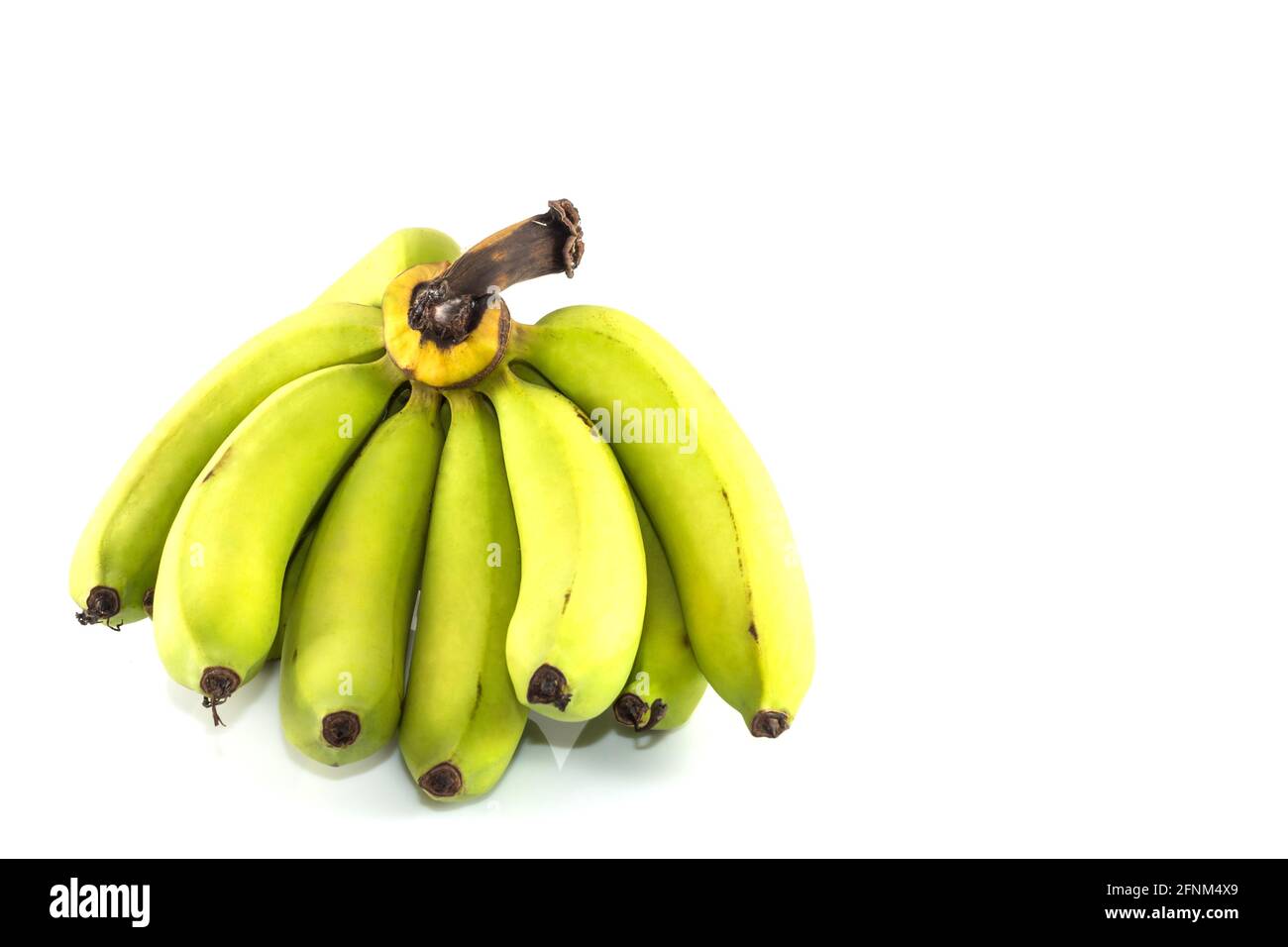 green banana bundle on white background Stock Photo - Alamy