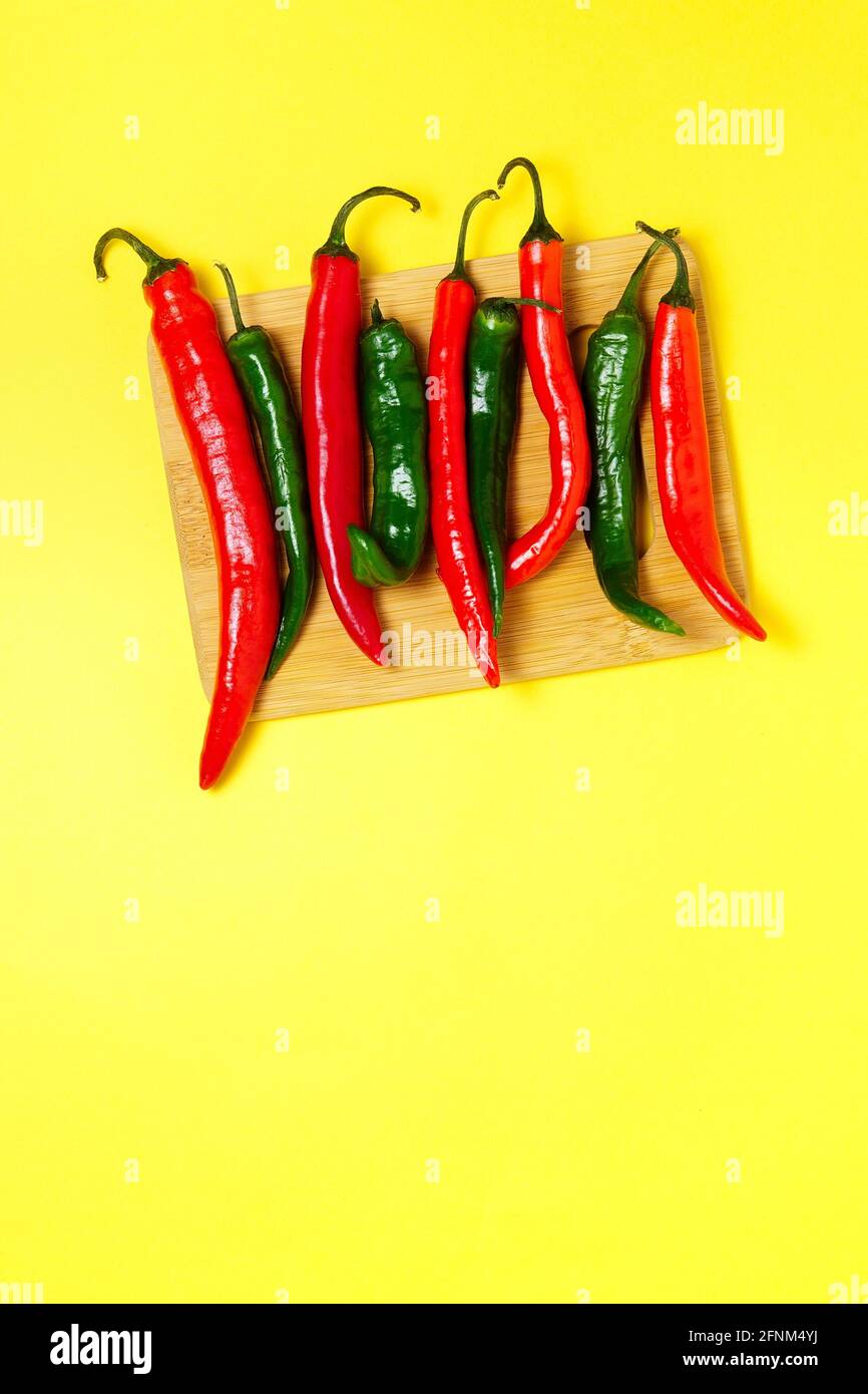 Red and green chili peppers. Vibrant color chili pepper. Hot spicy food ...