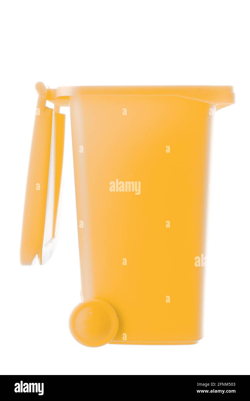 Plastic yellow trash can isolated on white background Stock Photo - Alamy