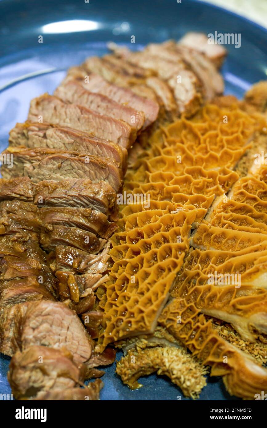 A delicious Chinese dish, a platter of braised vegetables, tripe and ...