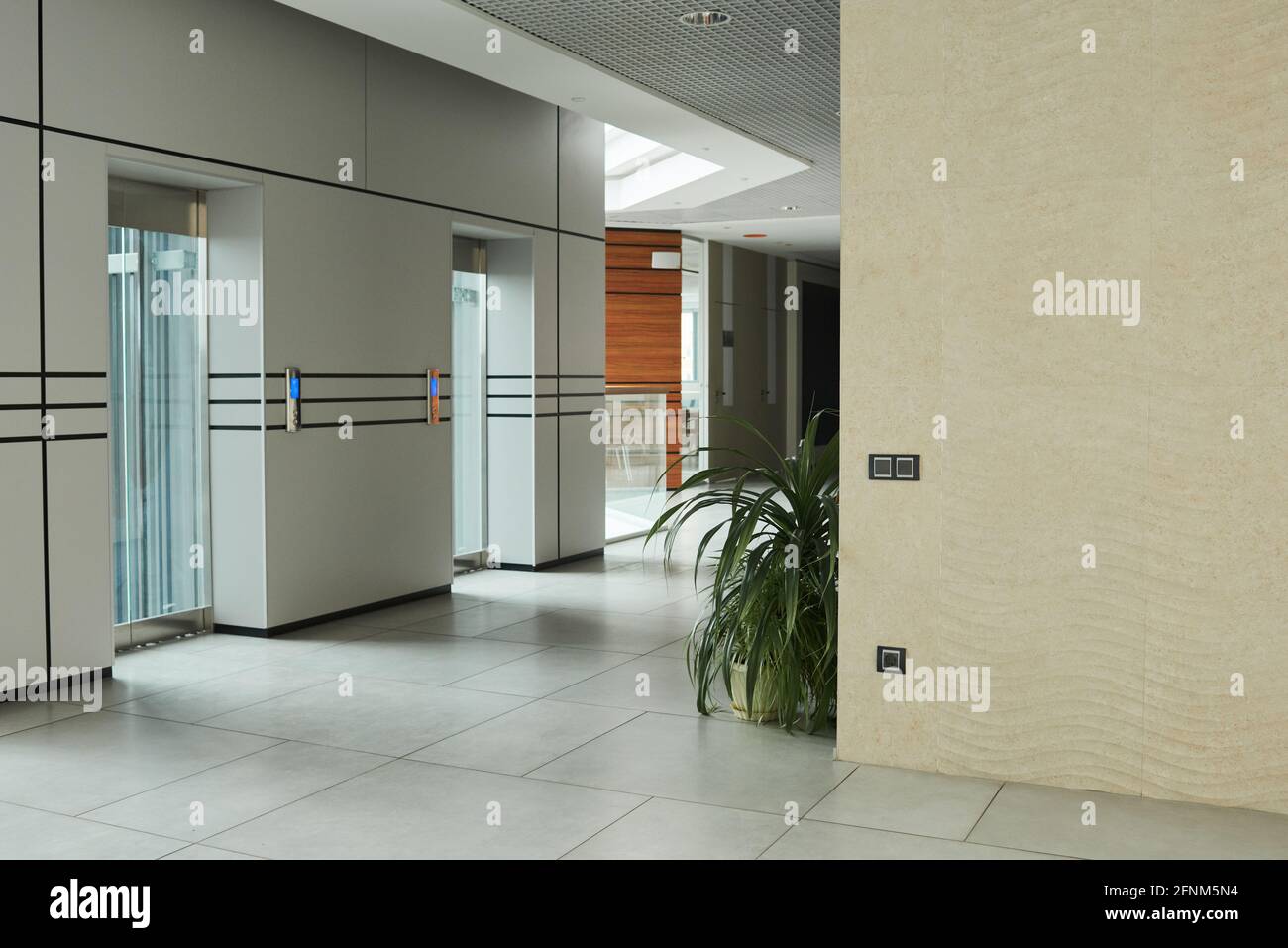 Image of modern corridor with elevator with glass doors in office ...