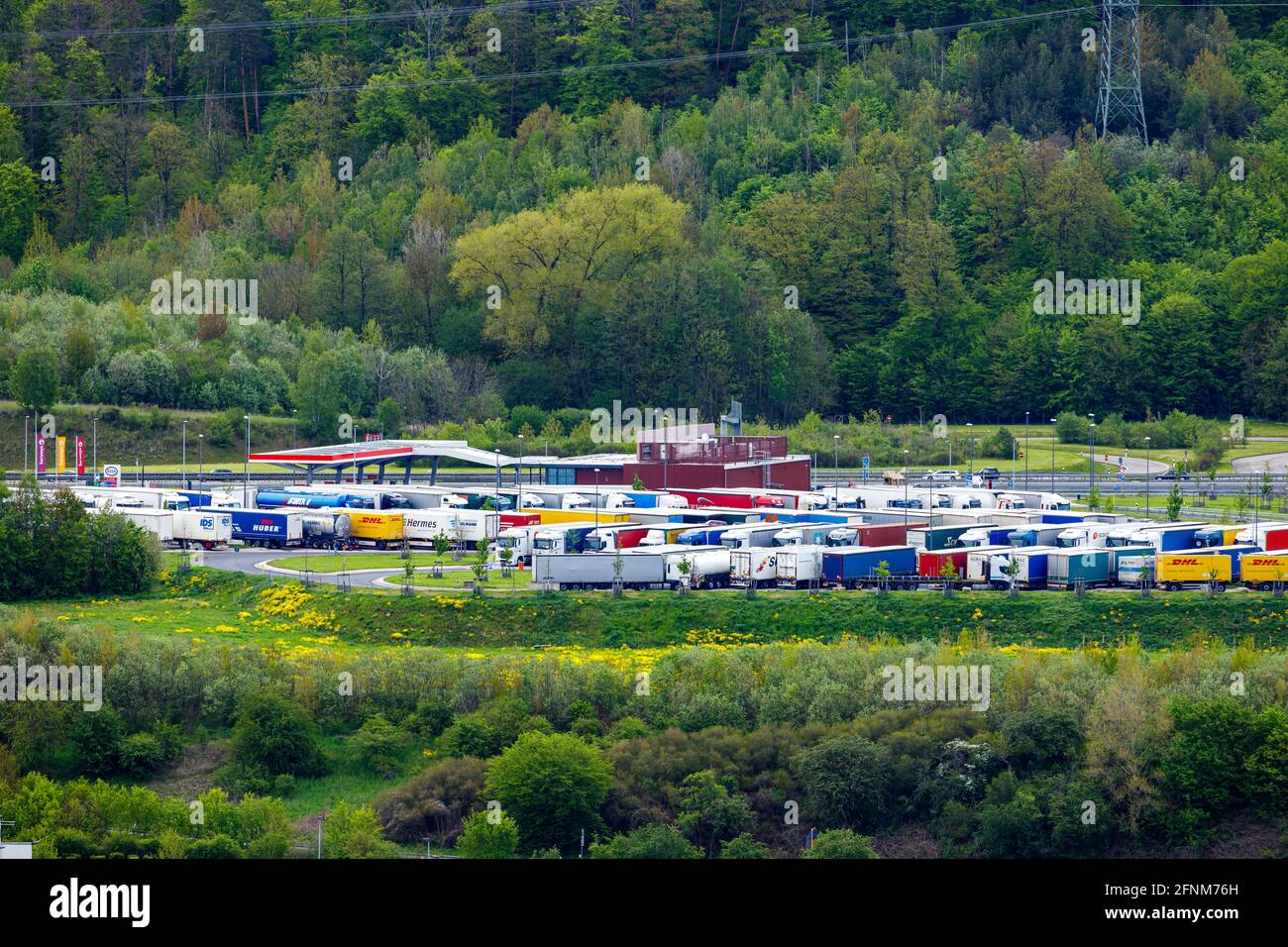 Truck stop and parking at a german Autobahn Stock Photo - Alamy