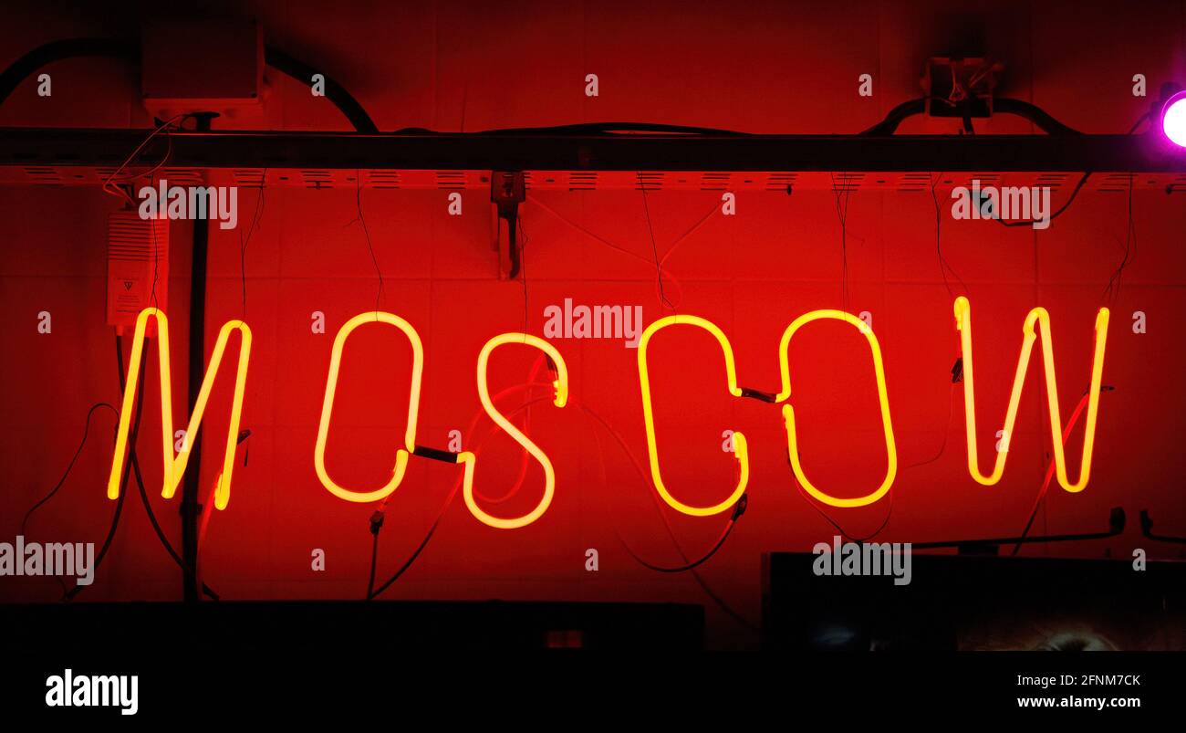 Neon letter sign with the name of city Moscow. Night decoration glowing ...