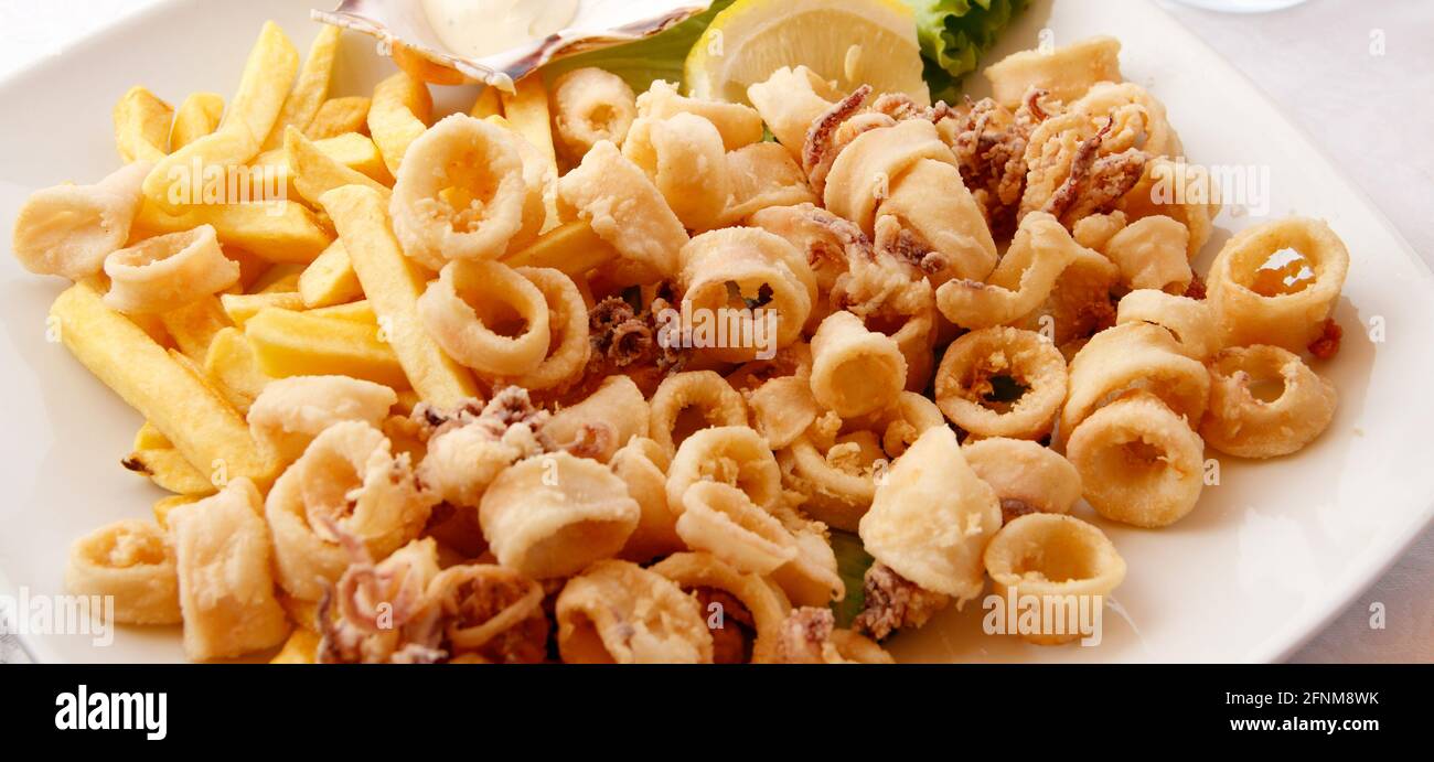 Calamari with potato hi-res stock photography and images - Alamy