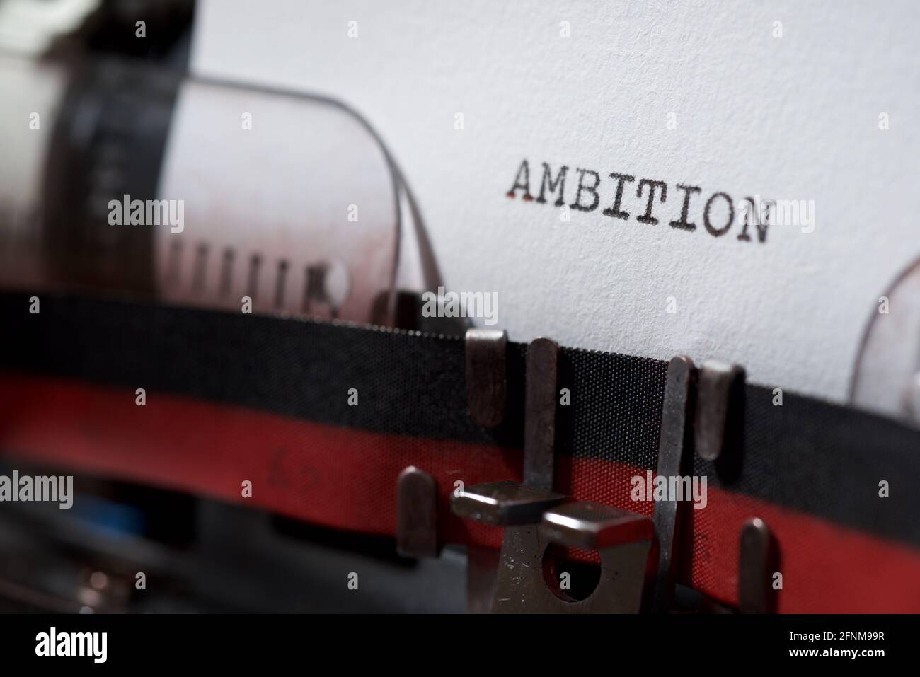 Ambition word written with a typewriter Stock Photo - Alamy