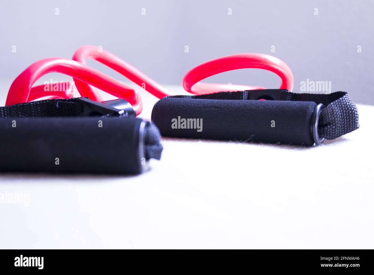 Elastic tape for resistance exercises. No people Stock Photo - Alamy