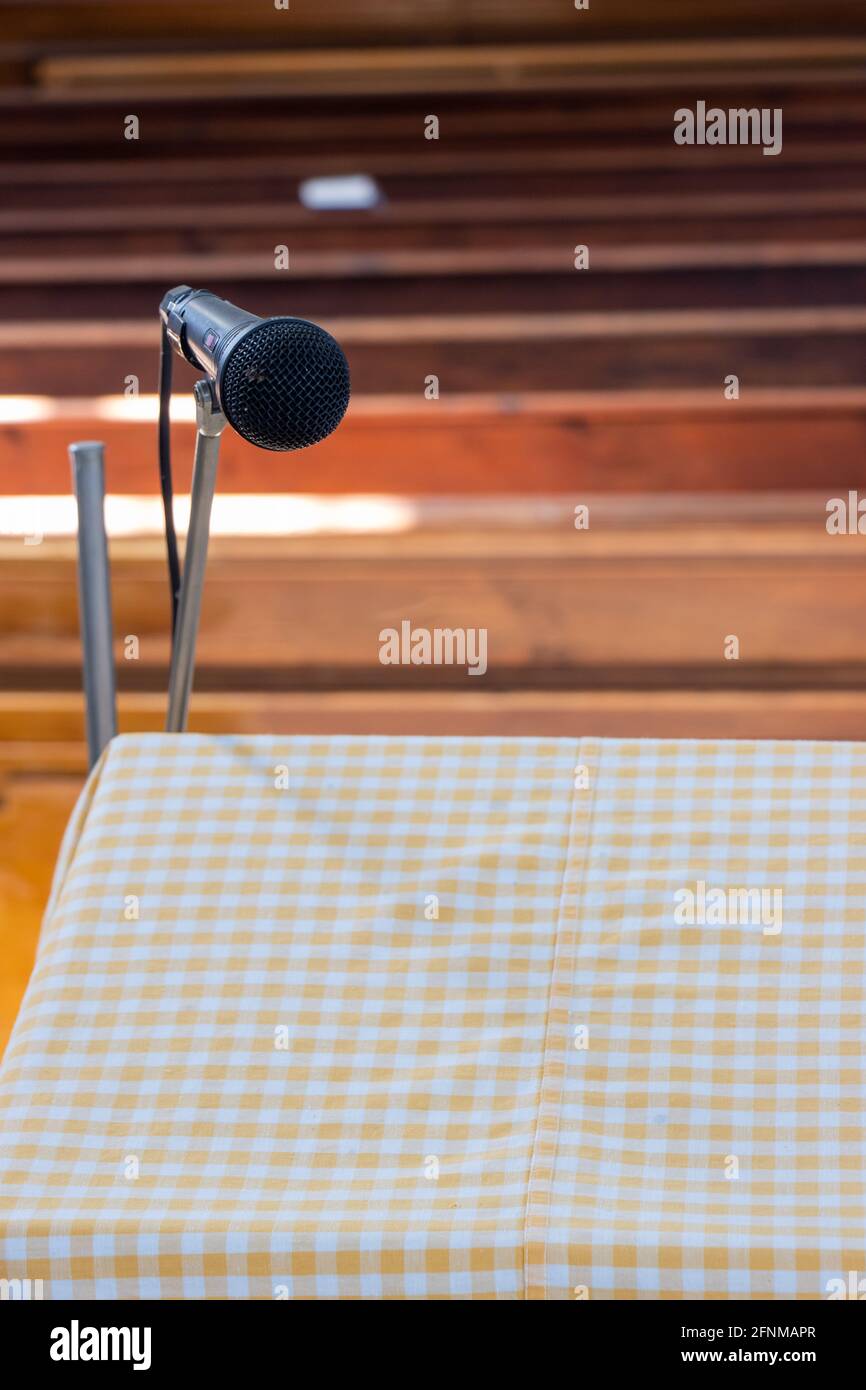 Empty lectern with a microphone in an empty church Stock Photo - Alamy