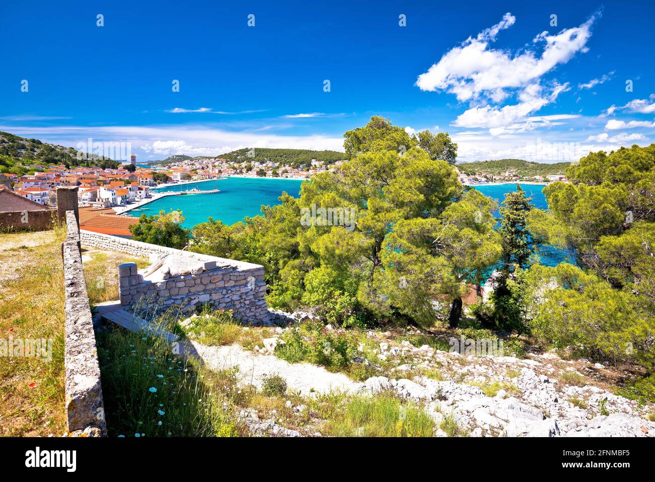 Coastal town of Tisno waterfront view, bridge to island of Murter ...