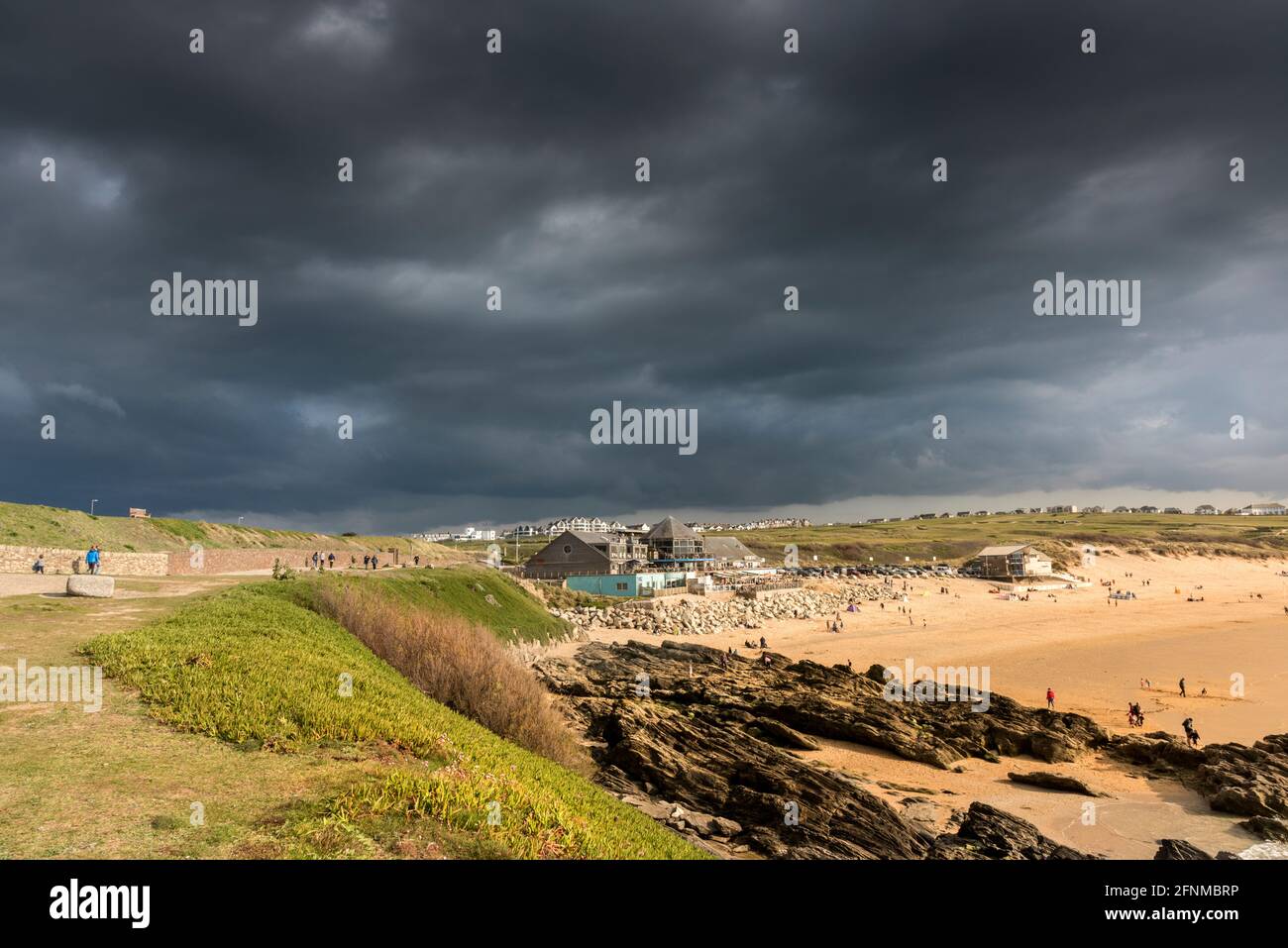 Dark heavy brooding rainclouds gathering over Fistral in Newquay in ...