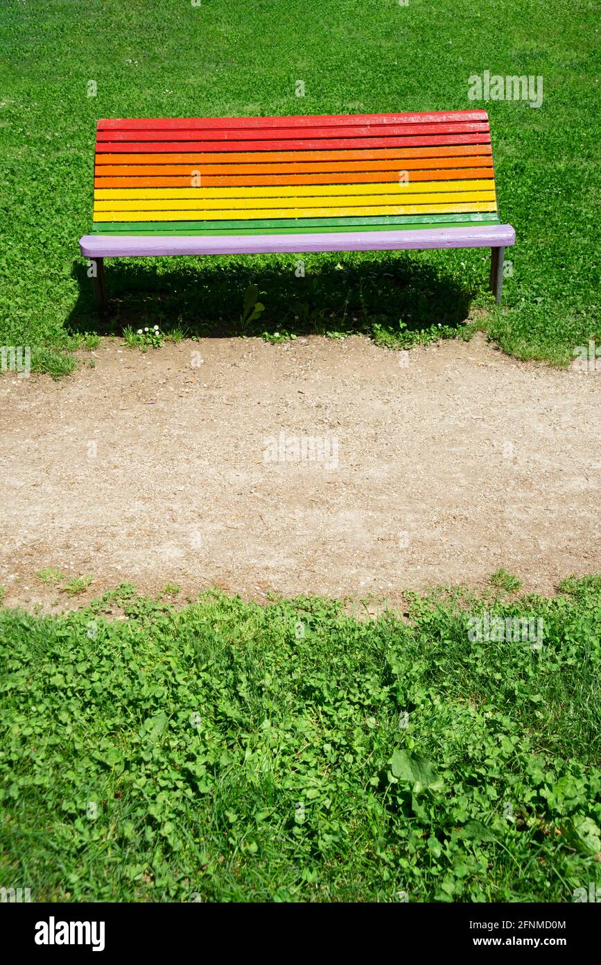 Bench Painted in Rainbow Colors in the Park Stock Photo - Alamy