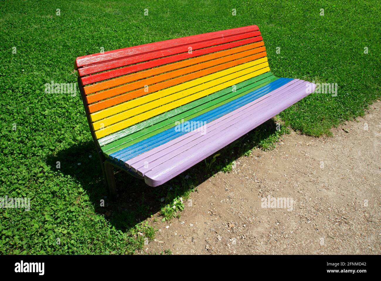 Bench Painted in Rainbow Colors in the Park Stock Photo - Alamy