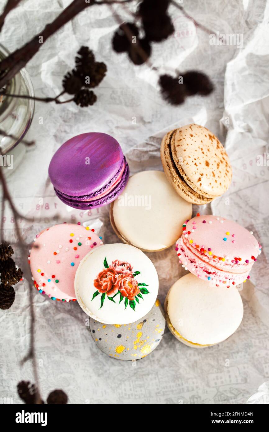 Colorful french macarons on gray background. Pastel colors. Top view ...