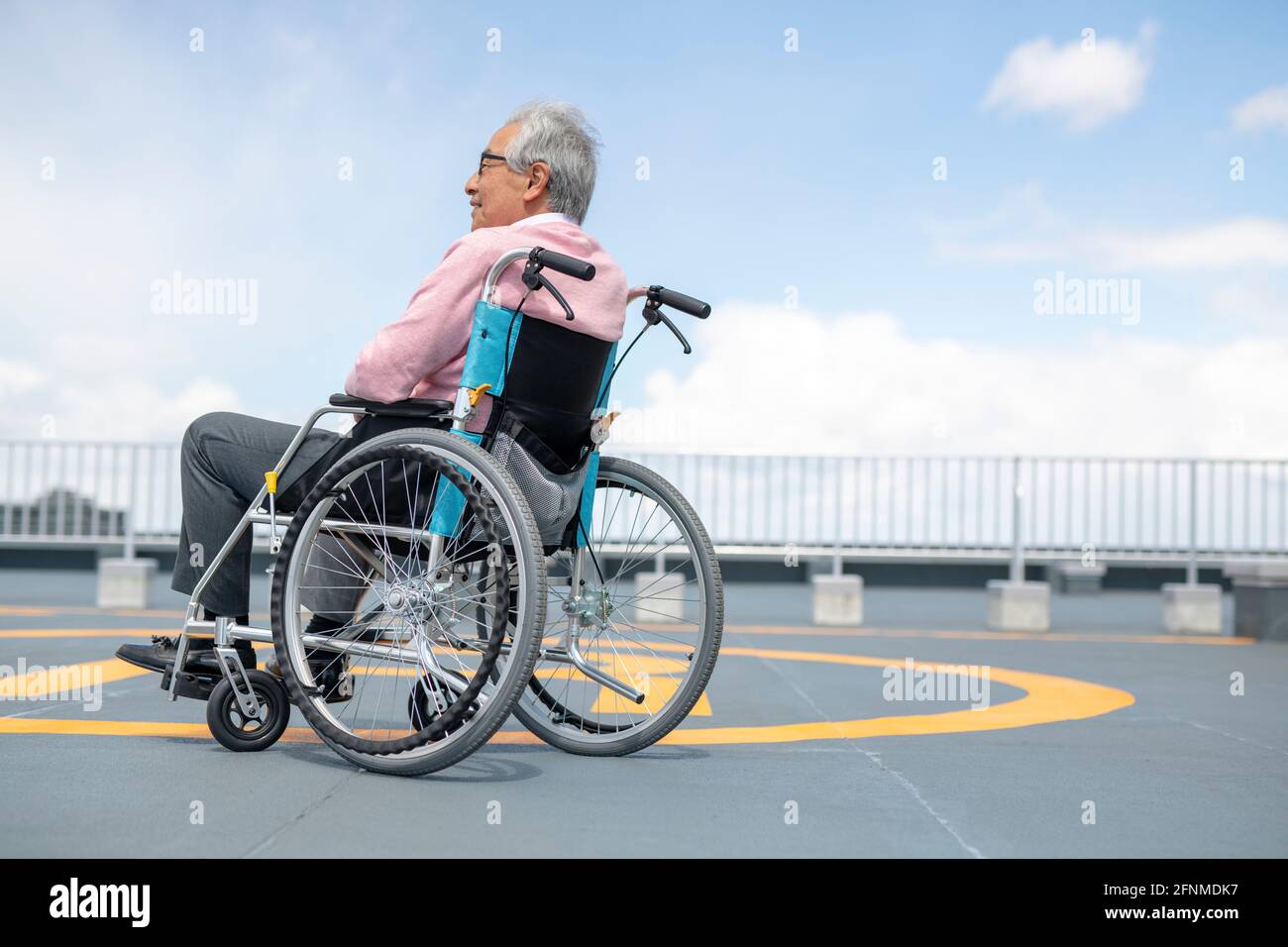 Man Using Wheelchair Stock Photo - Alamy