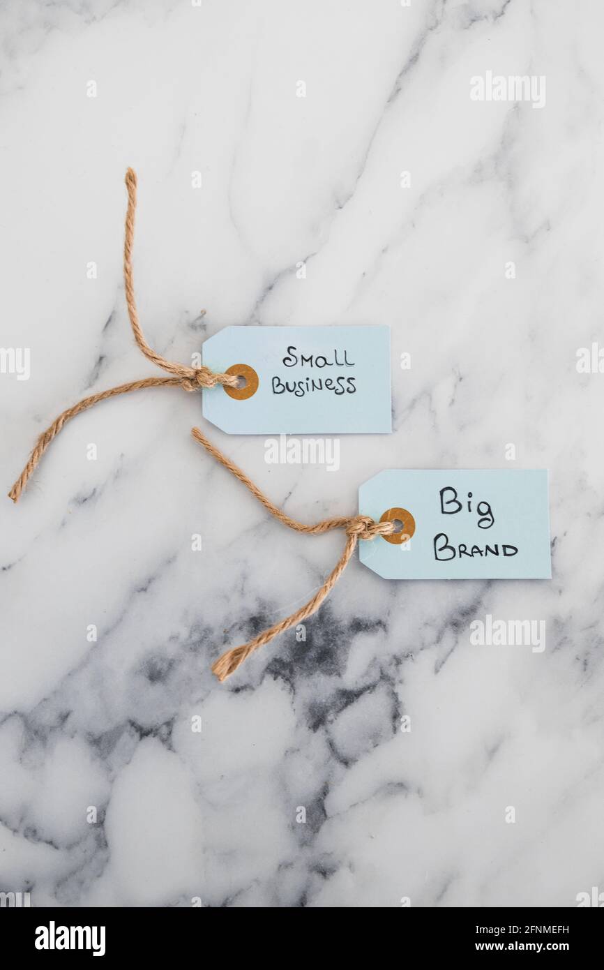 product tags with small business vs big brand texts, concept of ...