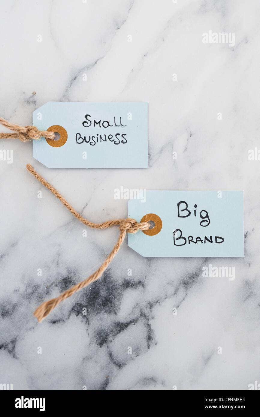 product tags with small business vs big brand texts, concept of ...