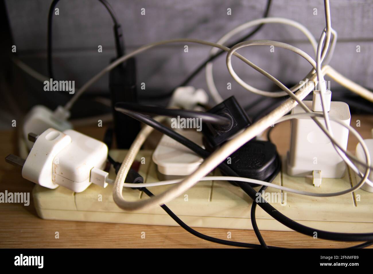 Tangled cords hi-res stock photography and images - Alamy