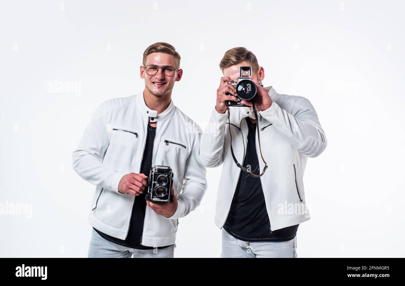 twin brothers men photographer in white casual look alike use vintage ...