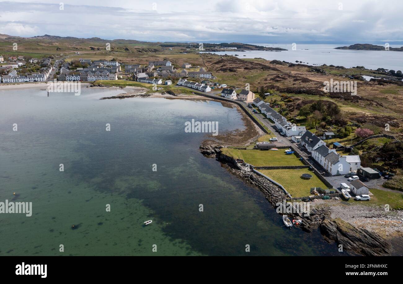 Aerial view of houses overlooking Leodamais Bay in Islay village of ...