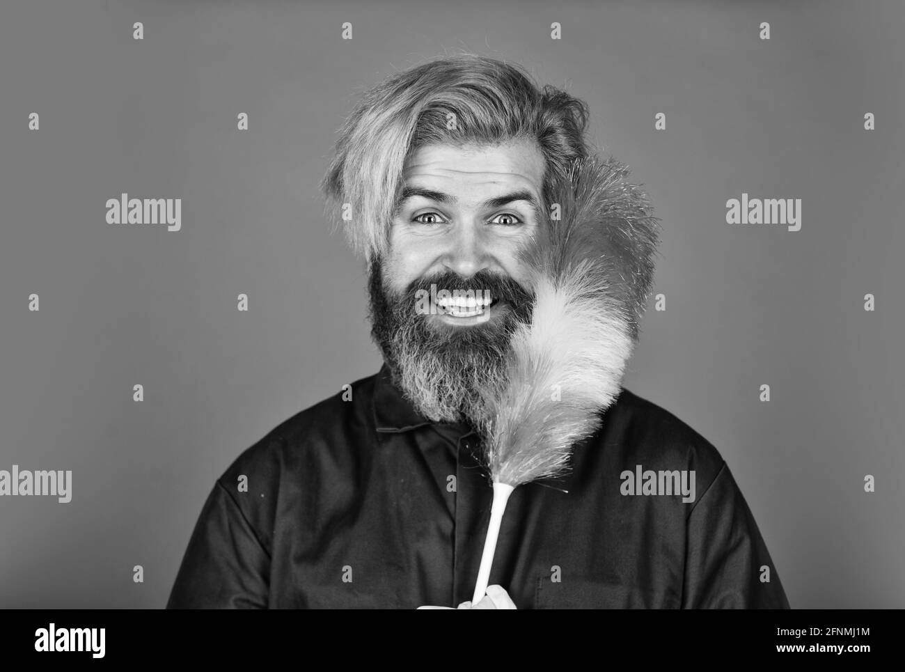 Man holding cleaning supplies Black and White Stock Photos & Images - Alamy