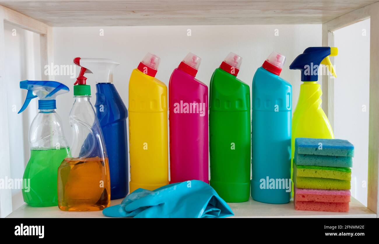 Cleaning products and tools on shelf in pantry room Stock Photo - Alamy