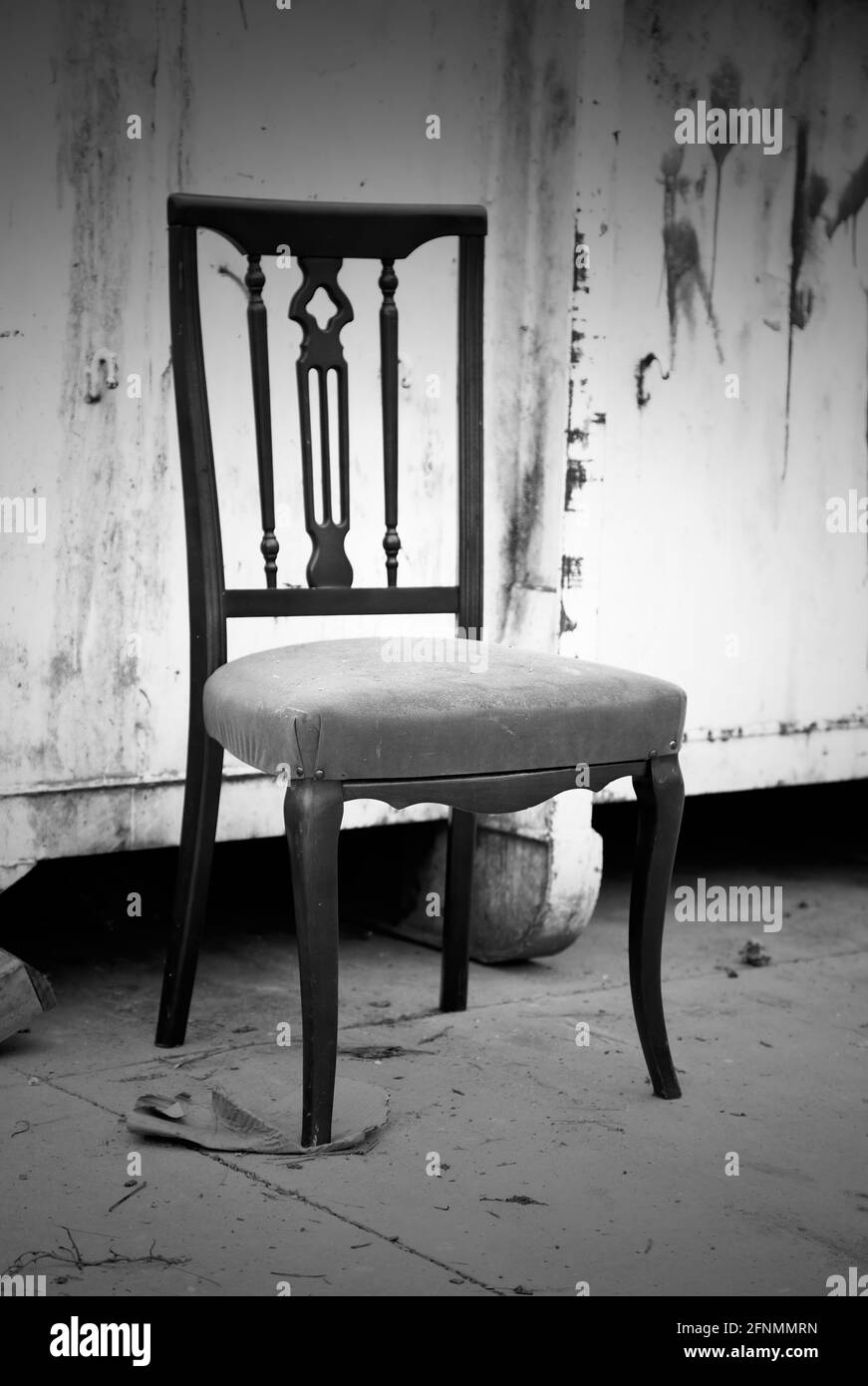 Wooden chair in garbage container, antique furniture, clean point Stock ...