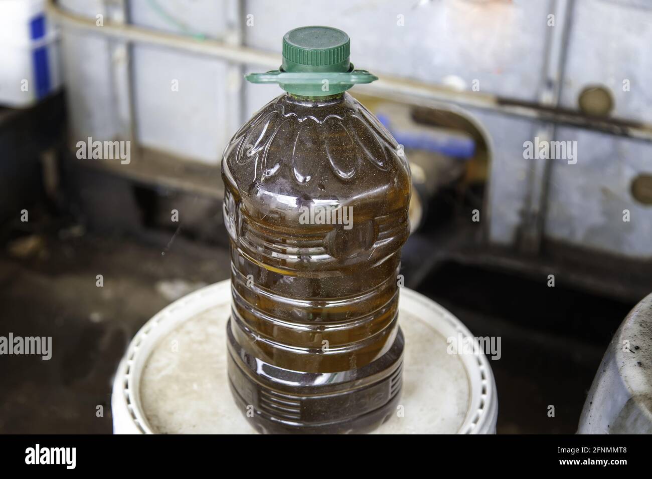 Container of recycled industrial used oil, manufacturing in company ...